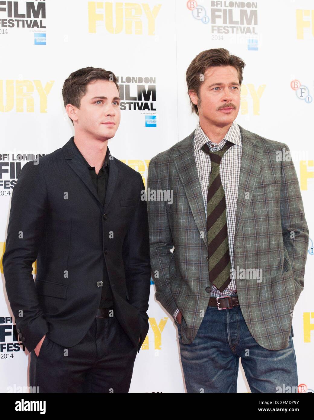 Logan Lerman and Brad Pitt attend the Fury photocall at The Corinthia ...