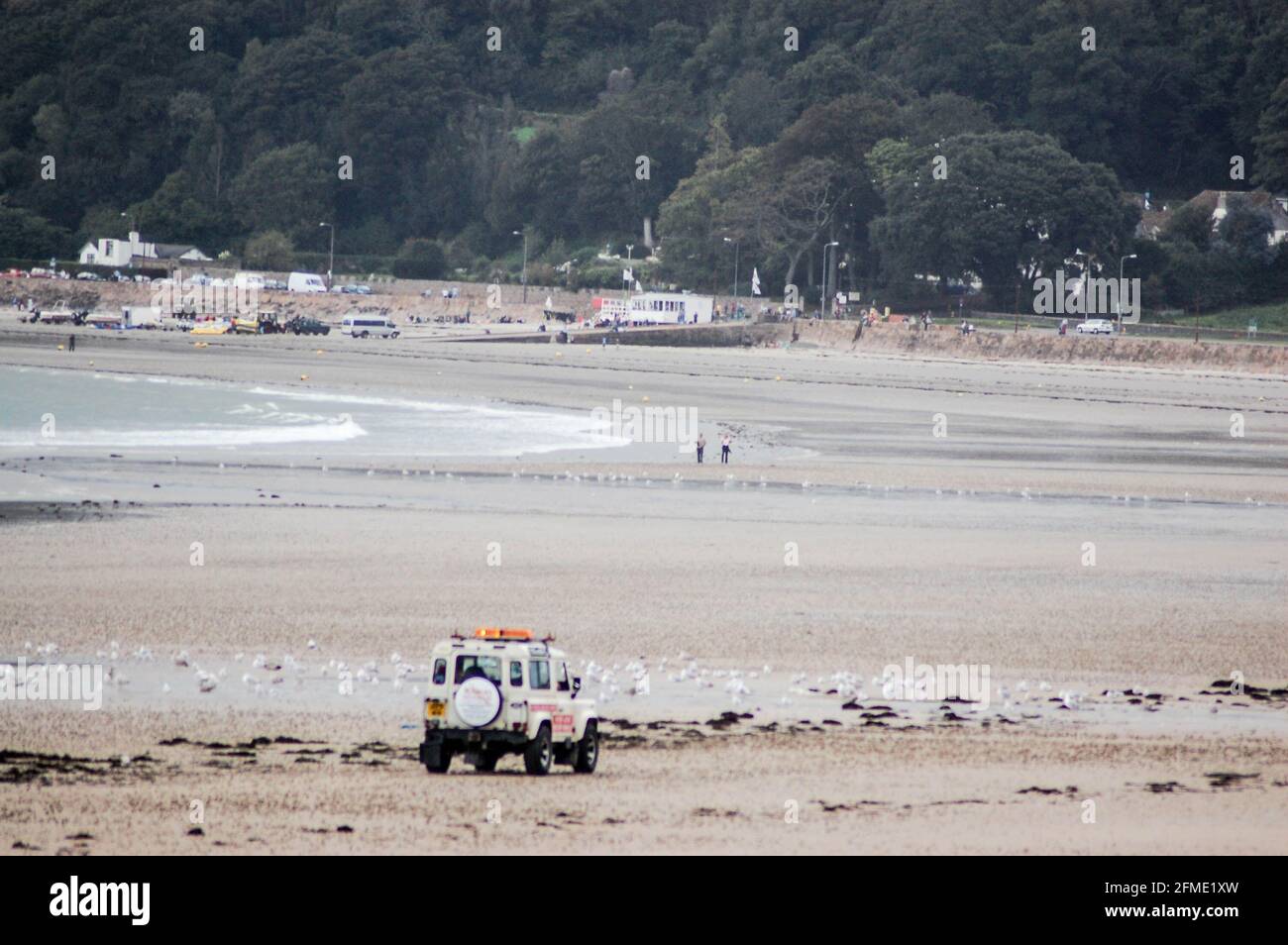 Land Rover on beach at Jersey air display Stock Photo - Alamy