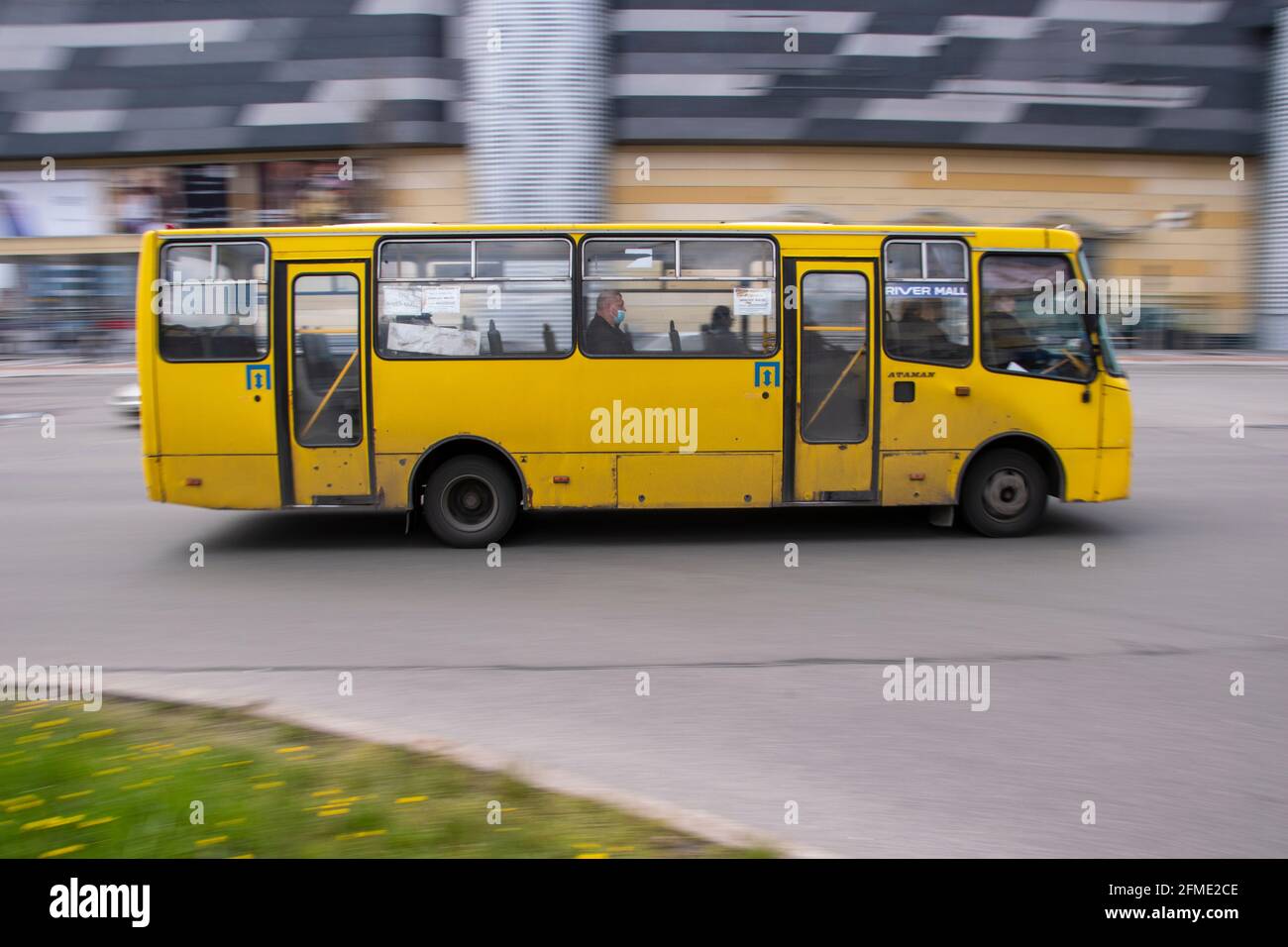 Ukraine, Kyiv - 26 April 2021: Yellow Ataman bus Public city Transport ...