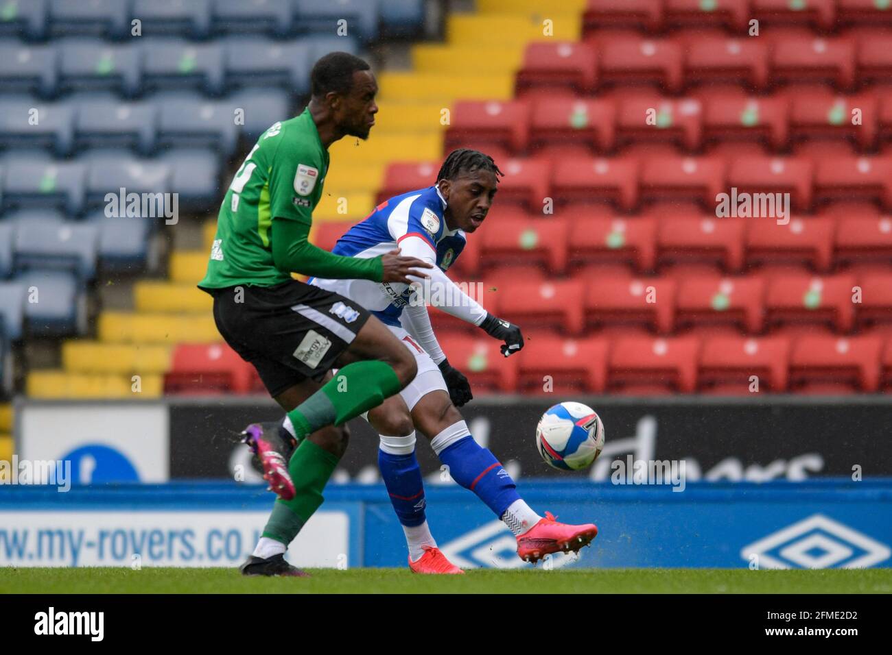 Amari’i Bell #17 of Blackburn Rovers crosses the ball while under ...