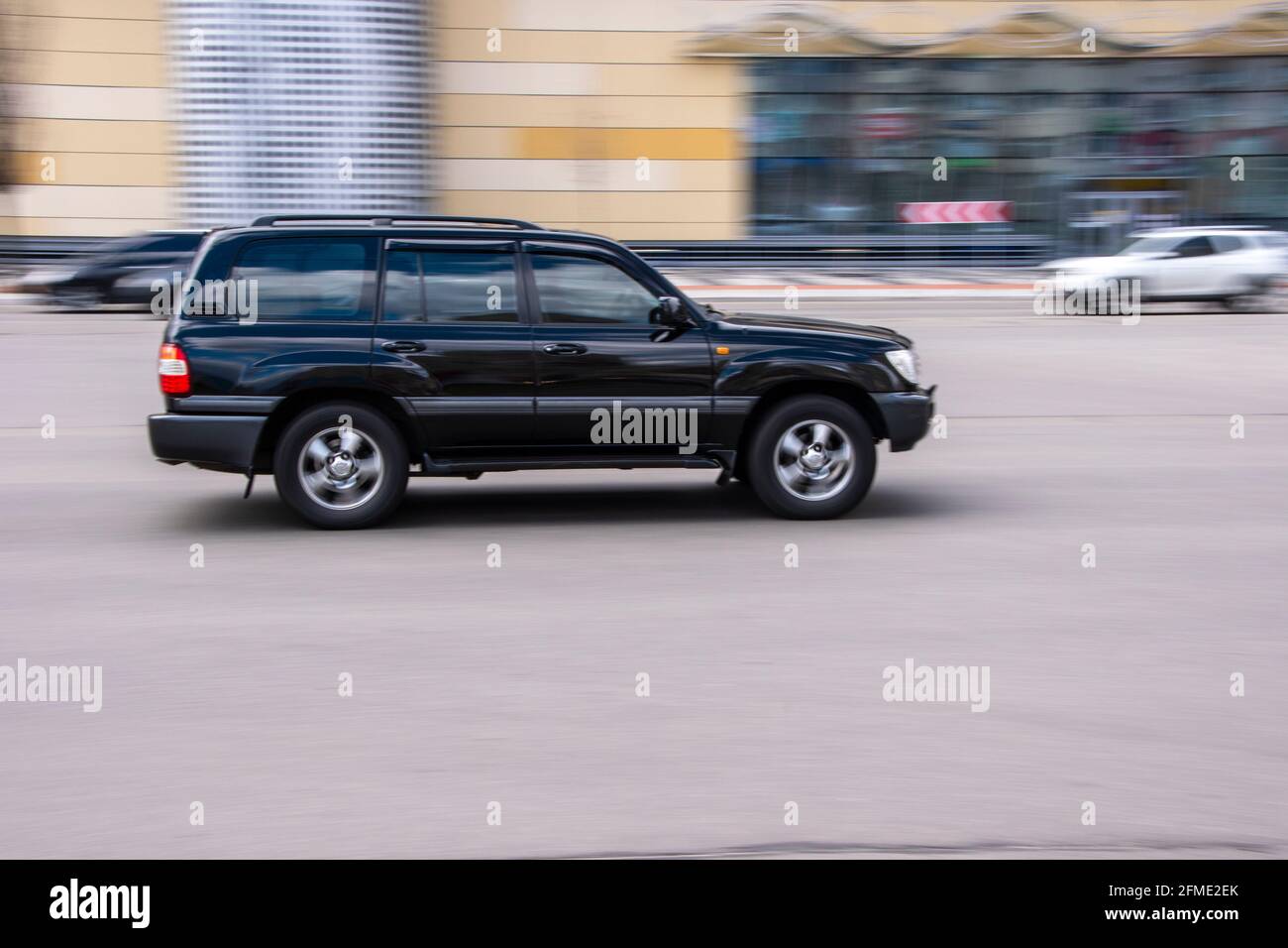 Ukraine, Kyiv - 26 April 2021: Black Toyota Land Cruiser car moving on ...
