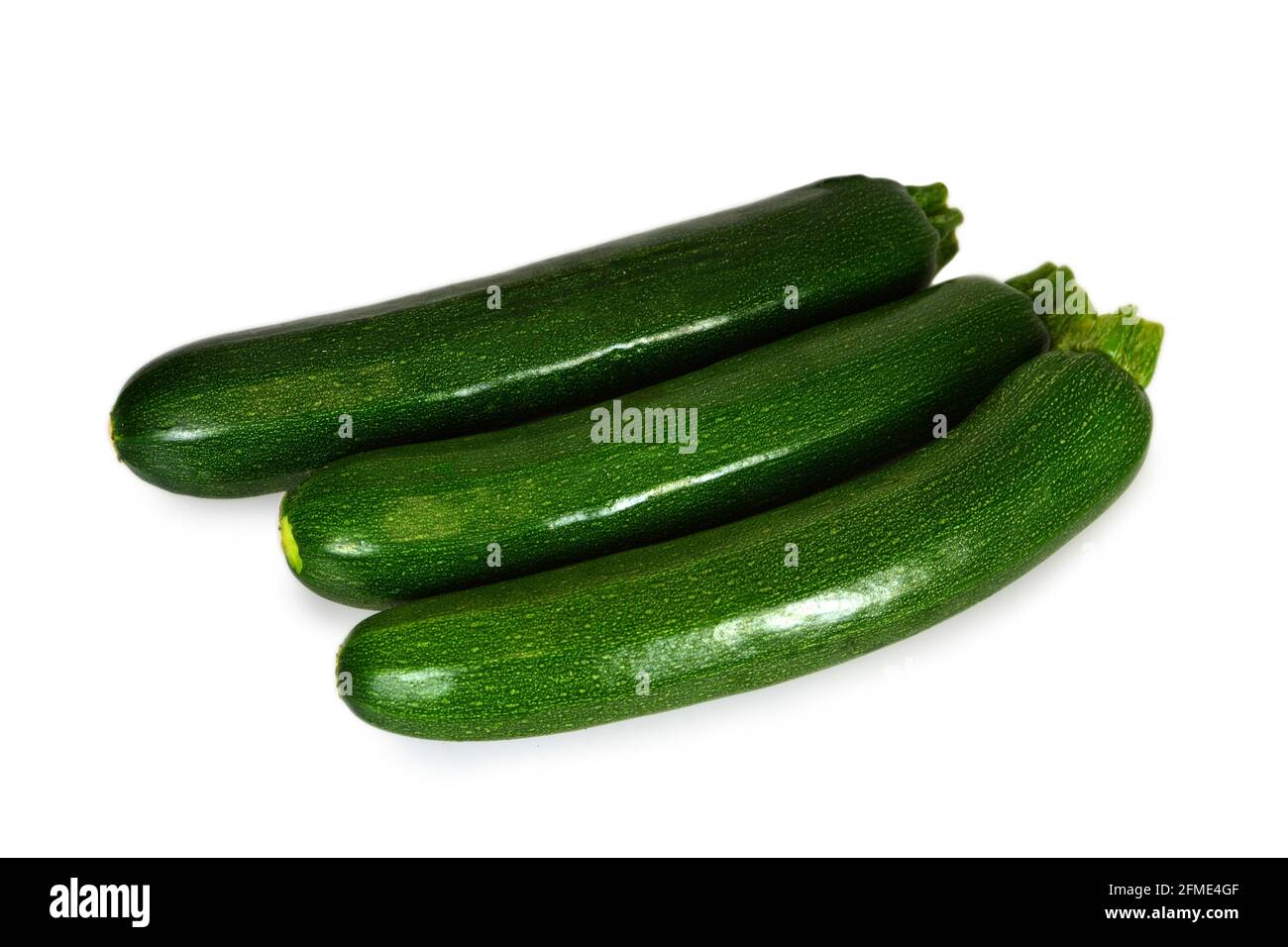 Zucchini isolated on white background Stock Photo - Alamy