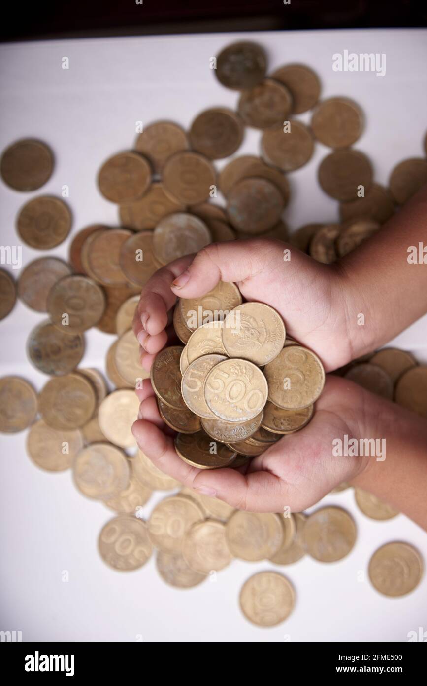 Child Coin Charity Box High Resolution Stock Photography and Images - Alamy
