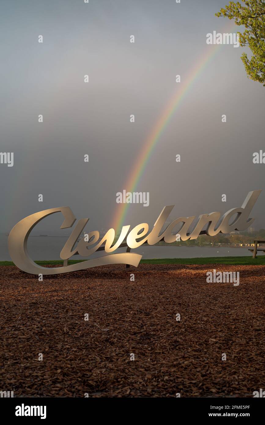 Cleveland script sign with rainbow from edgewater park with cityscape ...