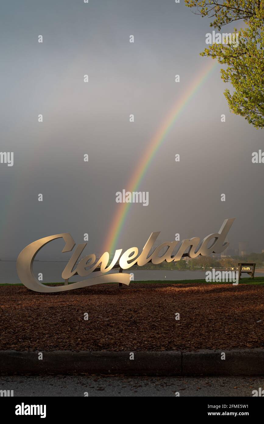 Cleveland script sign with rainbow from edgewater park with cityscape ...