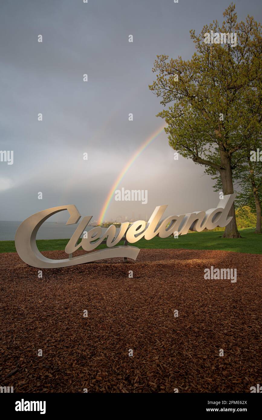 Cleveland script sign with rainbow from edgewater park with cityscape ...