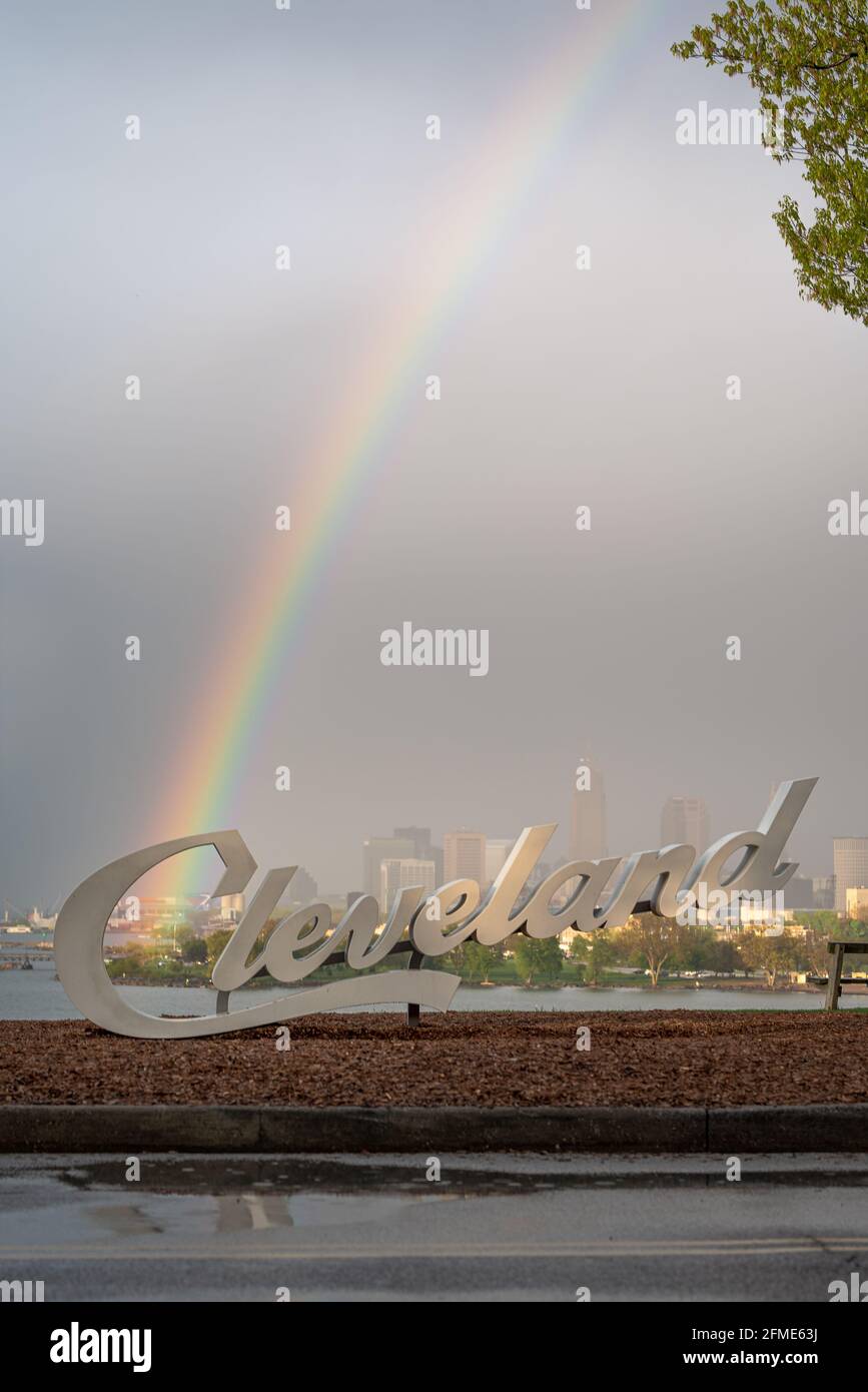 Cleveland script sign with rainbow from edgewater park with cityscape ...