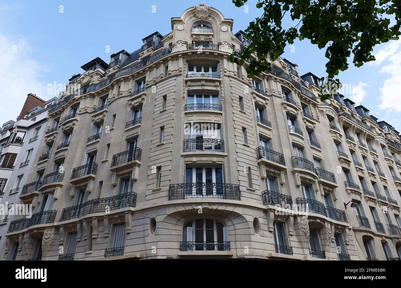 Traditional French house with typical balconies and windows. Paris ...
