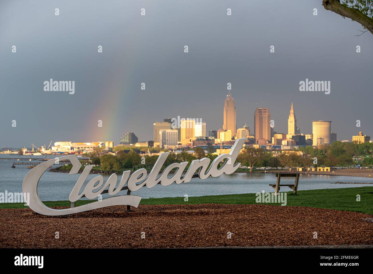 Cleveland script sign with rainbow from edgewater park with cityscape ...