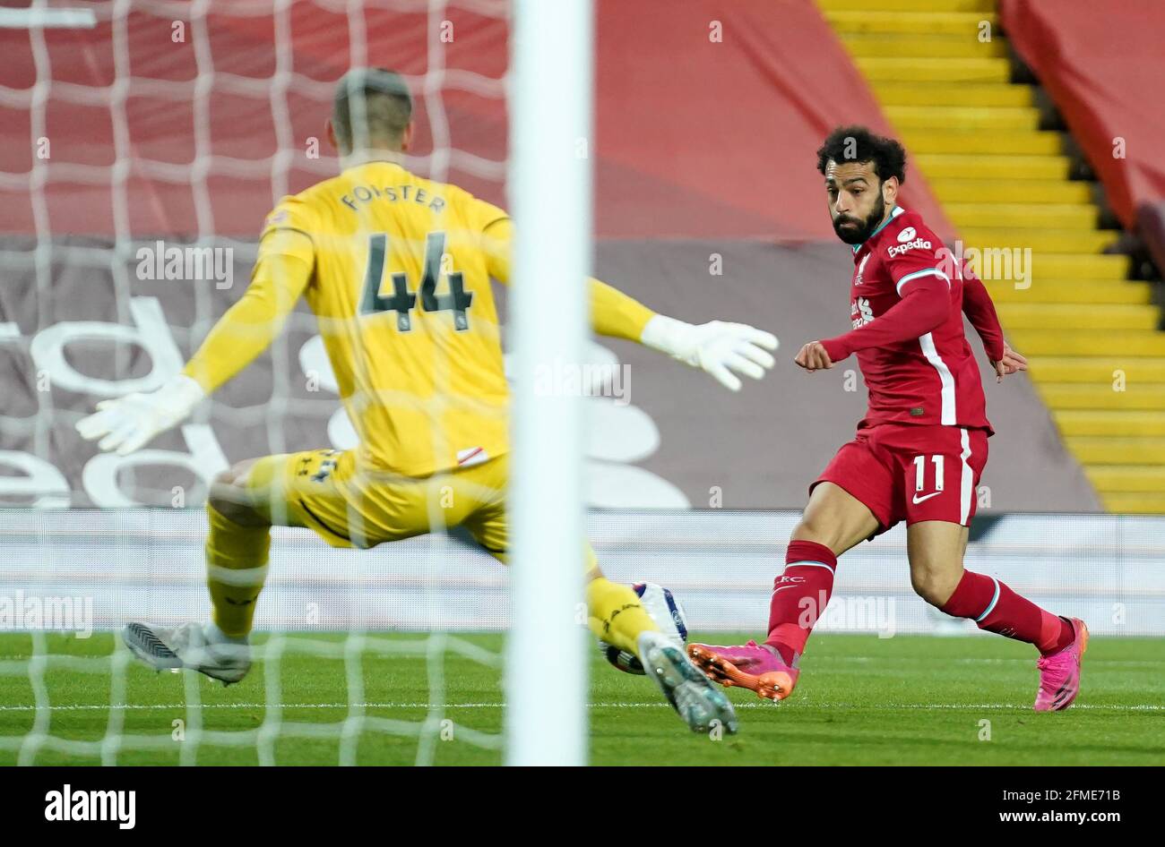 Liverpool's Mohamed Salah (right) attempts a shot on goal during the ...