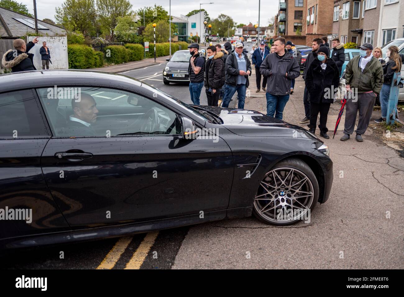 Club director arriving, with fans protesting outside the Roots Hall ...