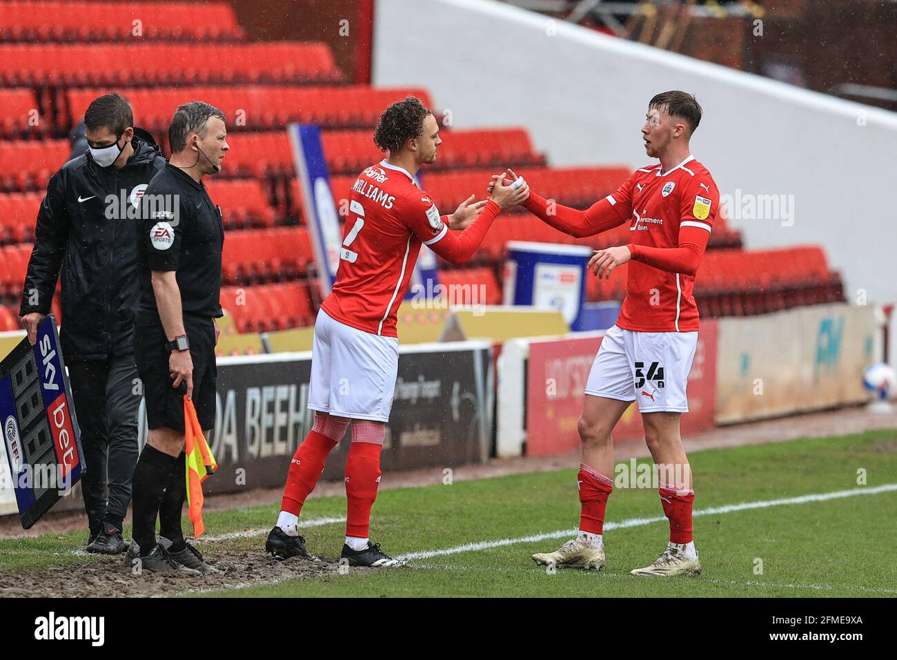 Jasper Moon #34 of Barnsley makes way for Jordan Williams #2 of ...