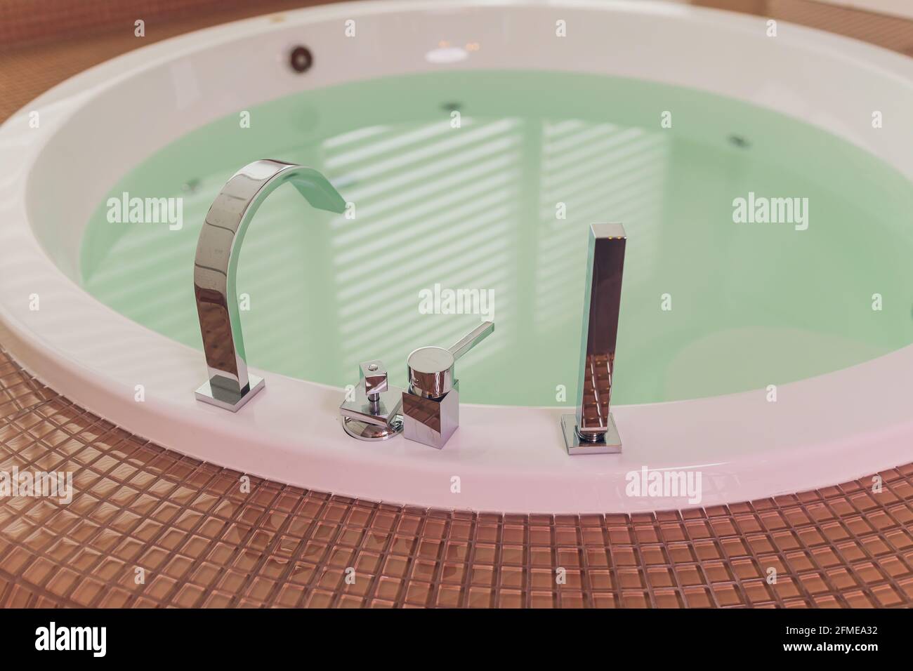 Couple jacuzzi view hi-res stock photography and images - Alamy