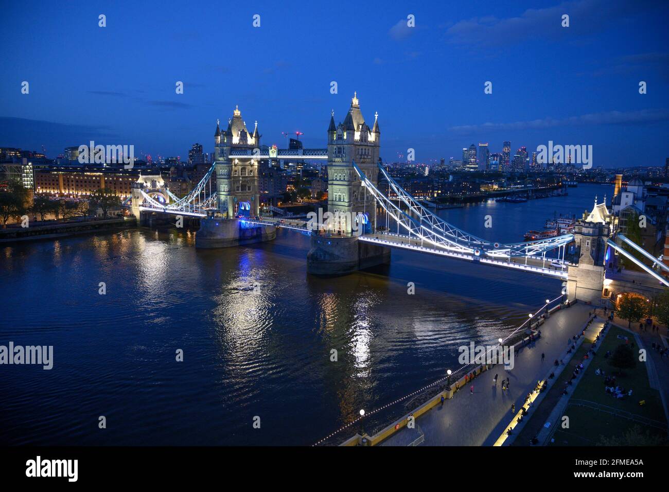 London, UK. 8 May 2021. London landmark buildings lit up on a clear ...