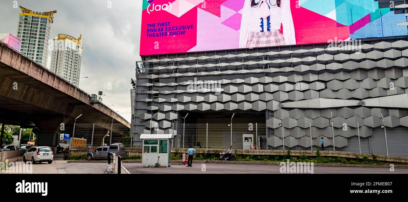 Huge colorful screens at the shopping center building in the metropolis ...
