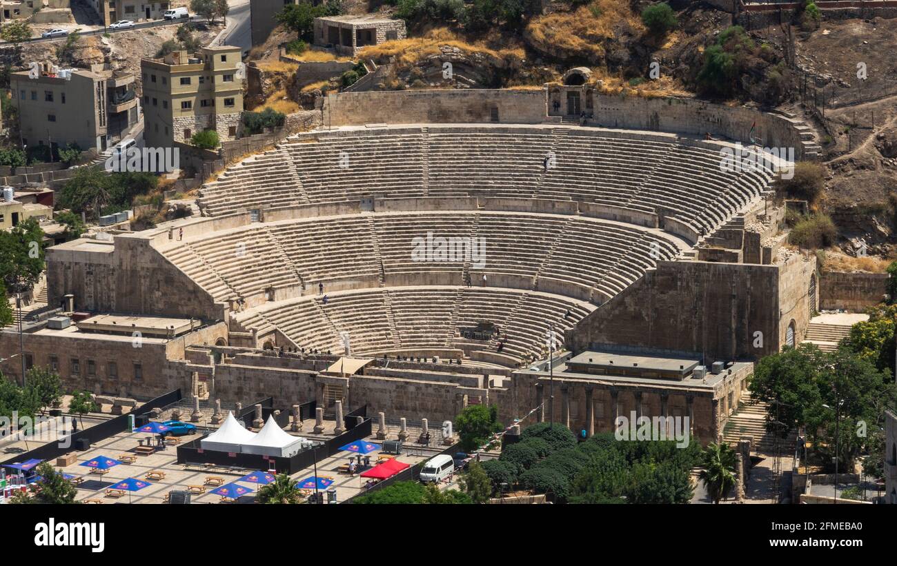 Top view Roman Amphitheatre and Odeon Theatre in Amman, Jordan, dating to 2-nd century, built on ...
