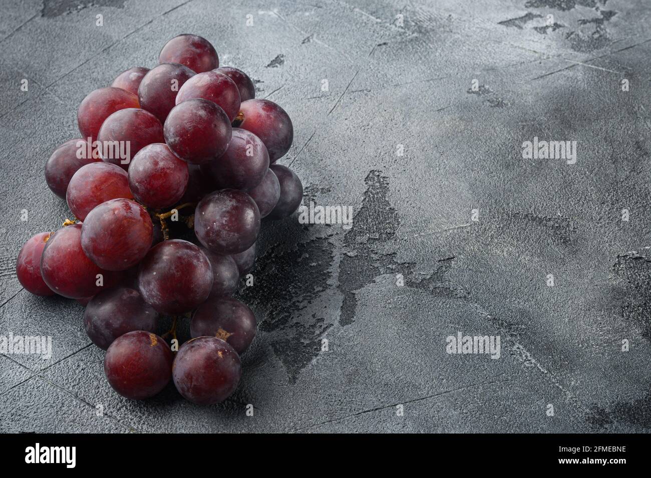 Shine Grape fruit set, dark red fruits, on gray stone background, with ...