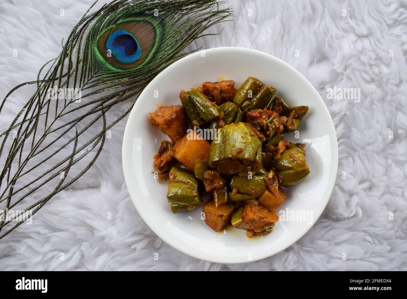 Parwal aloo ki sabji also known as Pointed gourd and potato fry curry ...