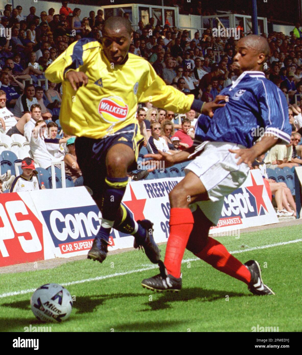 LEICESTER CITY FC. ANDREW IMPEY AND PORTSMOUTH FC'S FITZROY SIMPSON ...