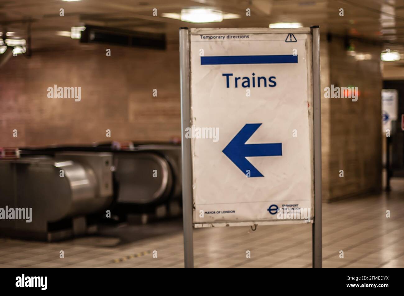 PICCADILLY CIRCUS, LONDON, ENGLAND- 6 May 2021: Trains directional sign ...