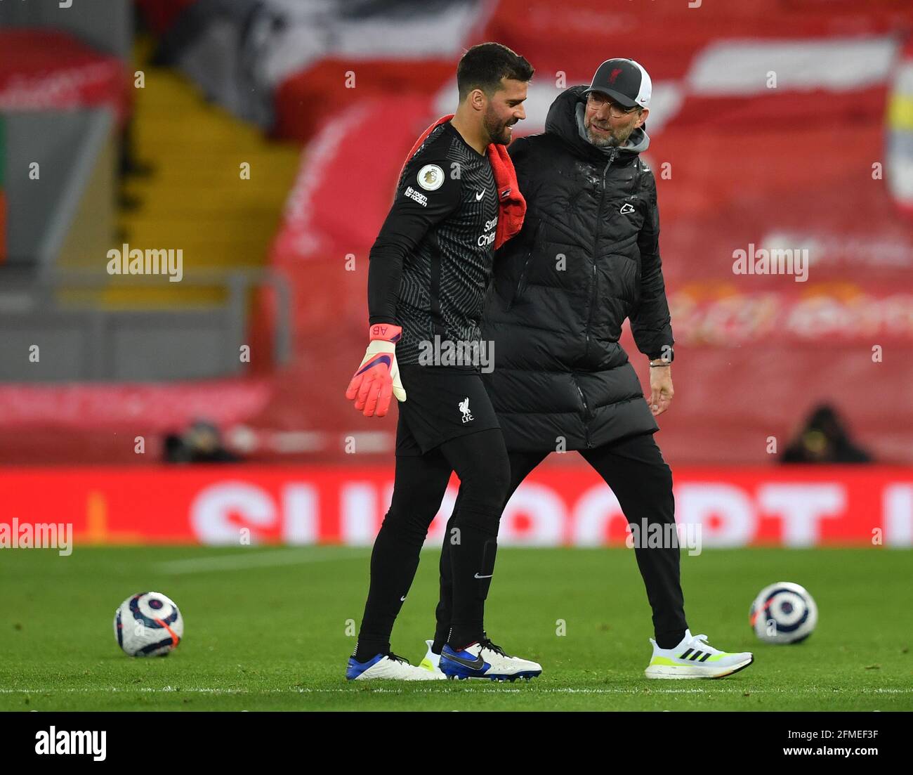 Liverpool manager Jurgen Klopp greets goalkeeper Alisson after the ...