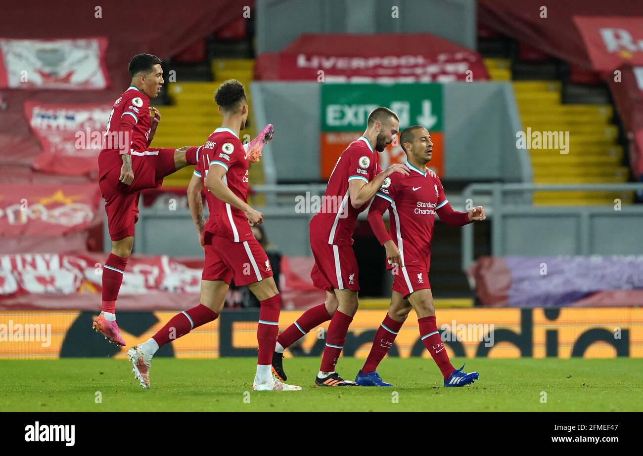 Liverpool's Thiago Alcantara (right) celebrates scoring their side's ...