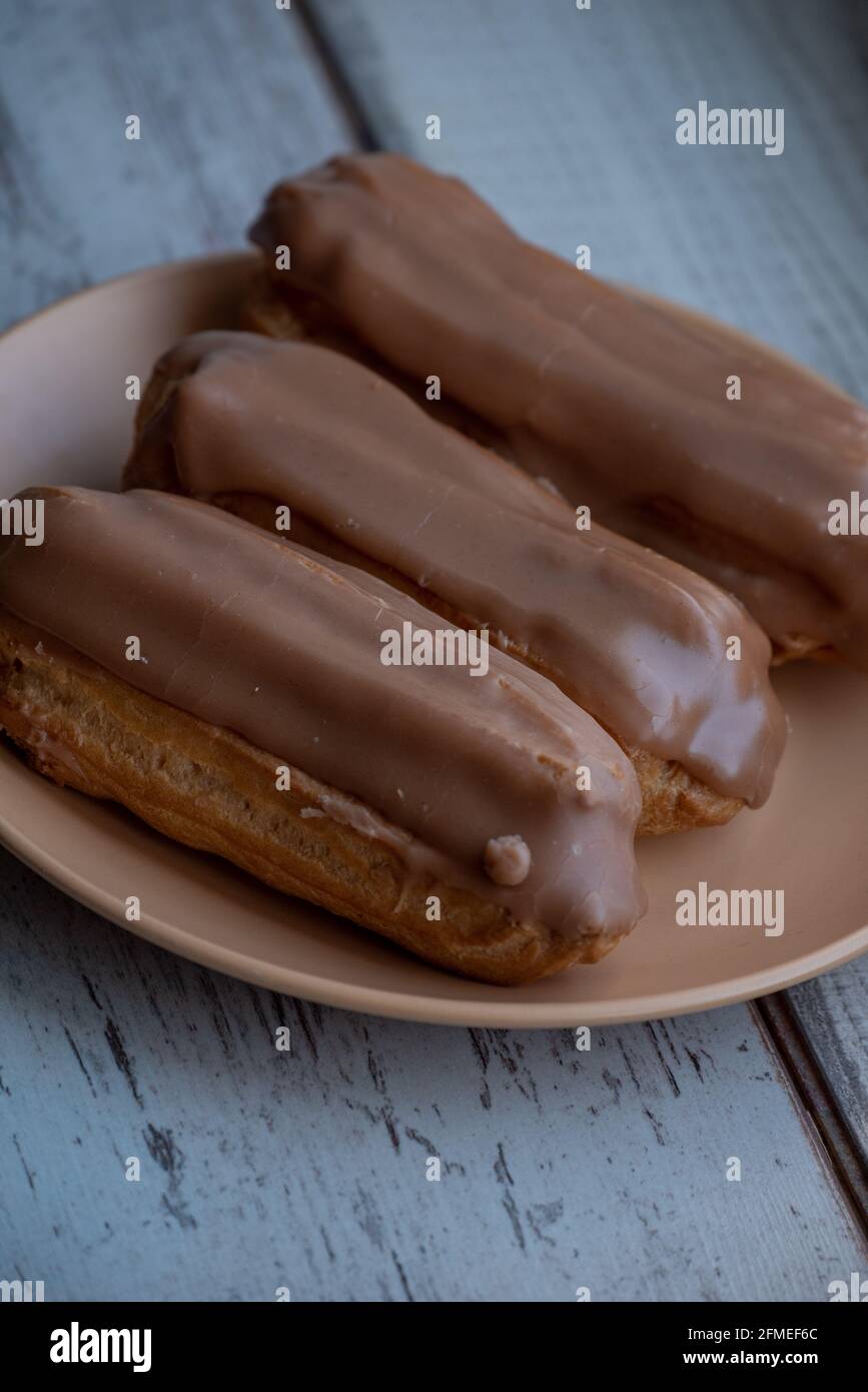 fatty sweet food. Cakes on a beige plate on the table. plate, snack ...