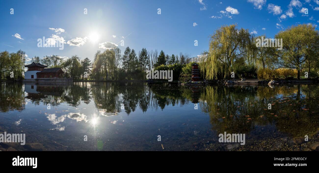 Chinese pagoda near the lake. Spring landscape. Panoramic view Stock ...