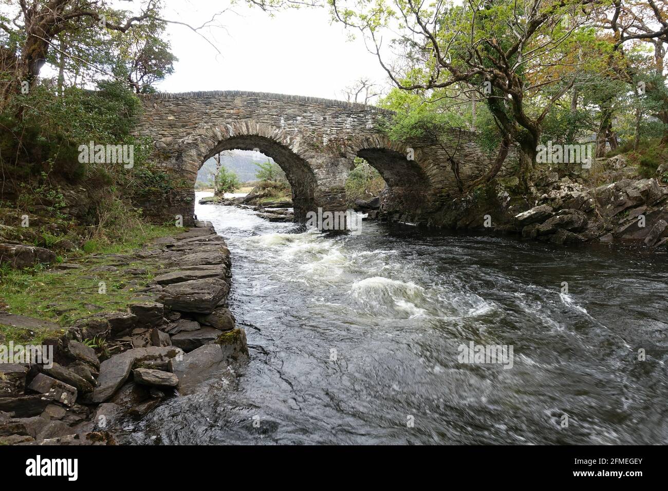 Scenic view of the Old Weir Bridge in Killarney National Park, CIreland ...