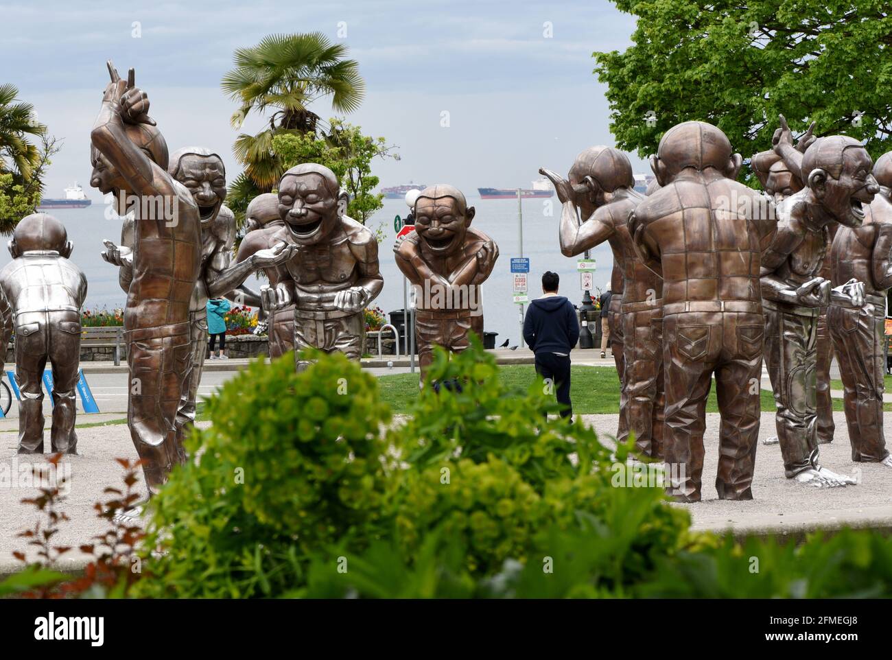 Statues from the sculpture A-Maze-ing Laughter by artist Yue Minjun ...