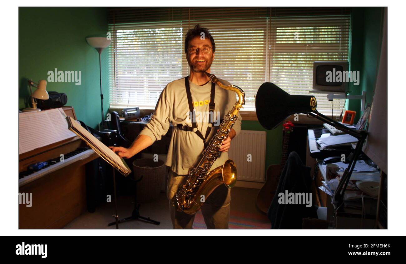 Tim Whitehead plays the sax at his home in Ham, Richmond.pic David ...