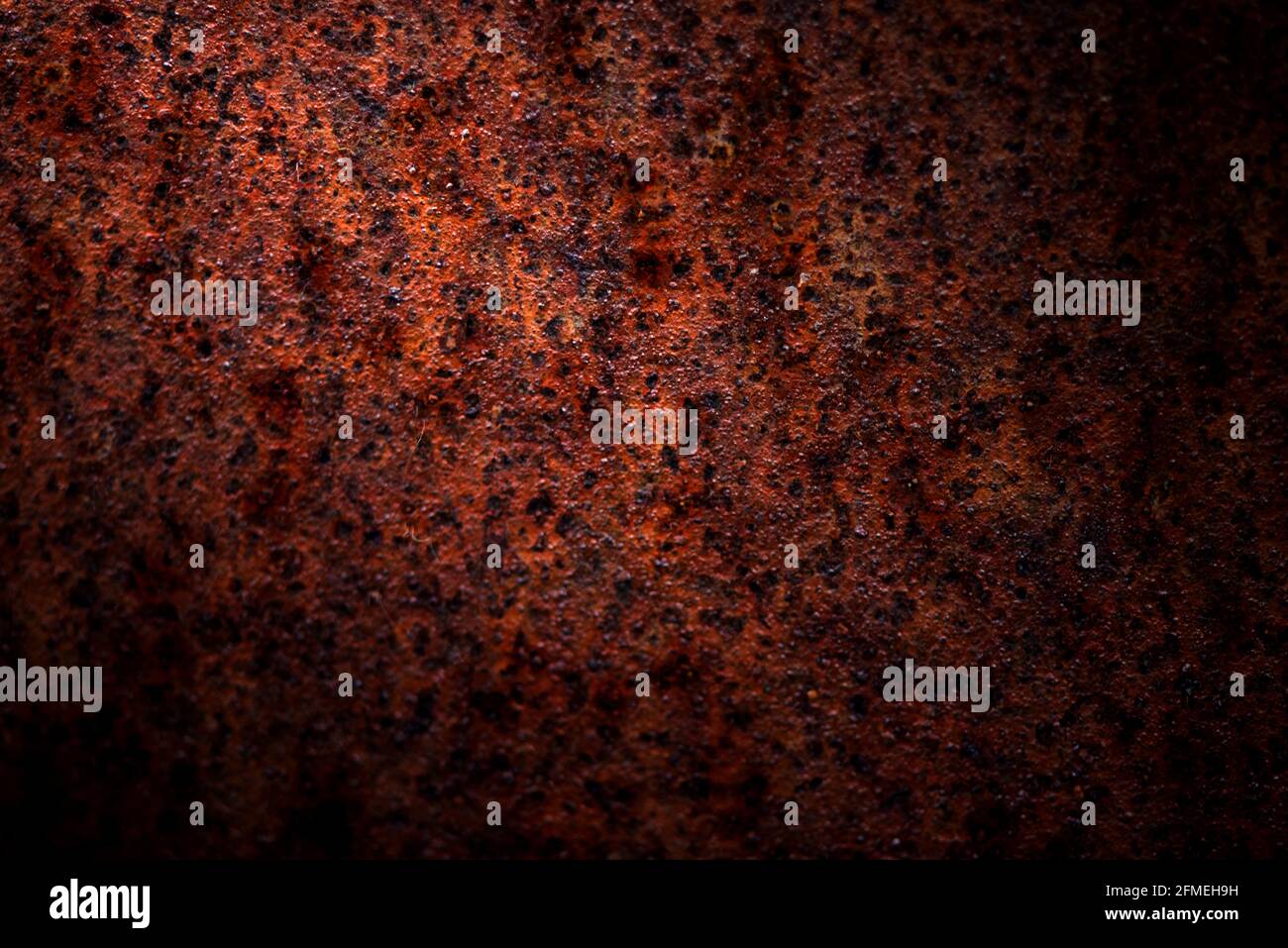red and black rust background texture with faint marked side light ...