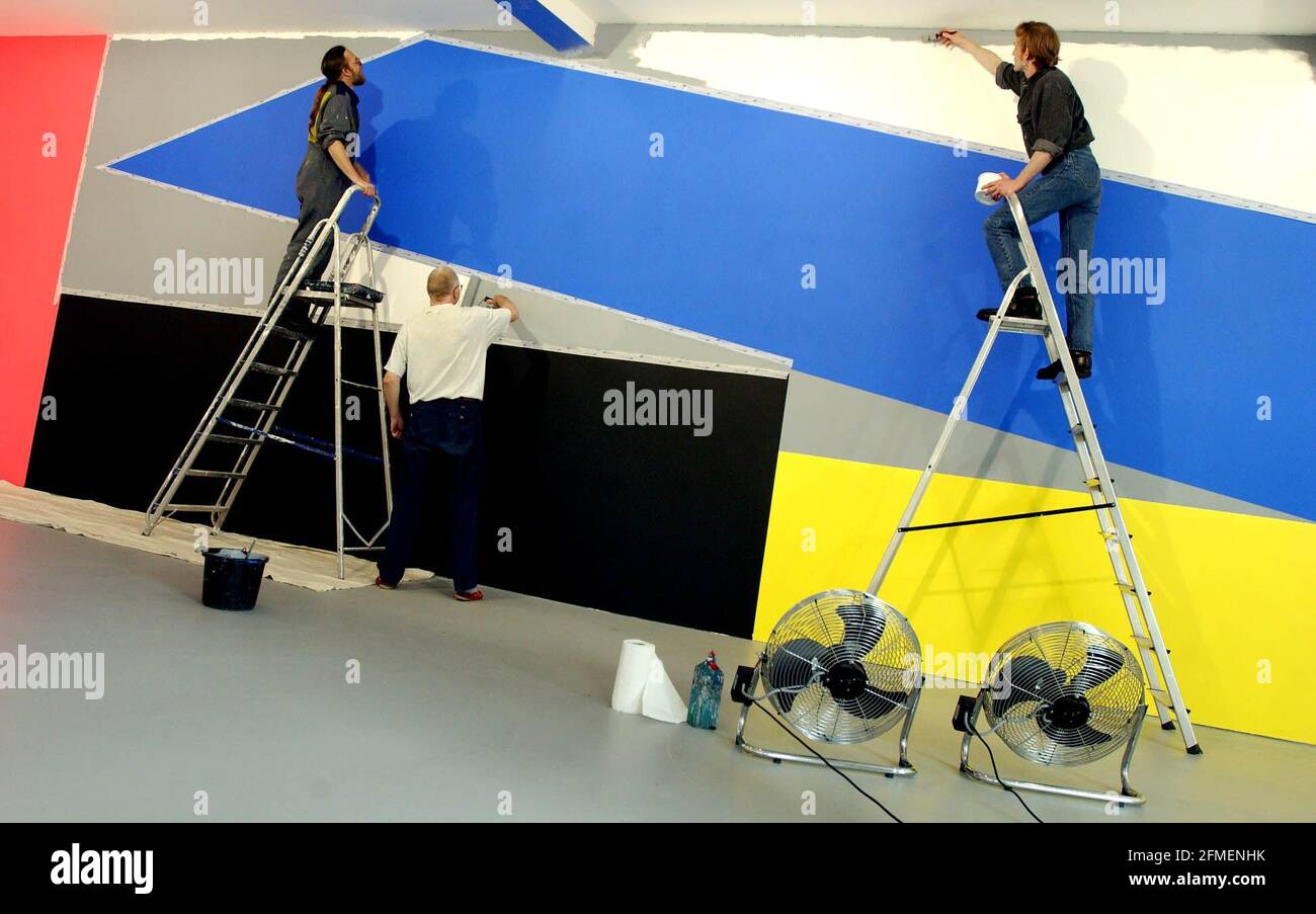 Artist Paul Huxley (centre) with his two sons at the Rhodes + Mann ...