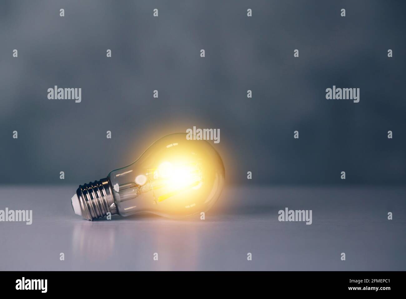 Light bulb with symbol of idea and inspiration, lightbulb with thinking ...