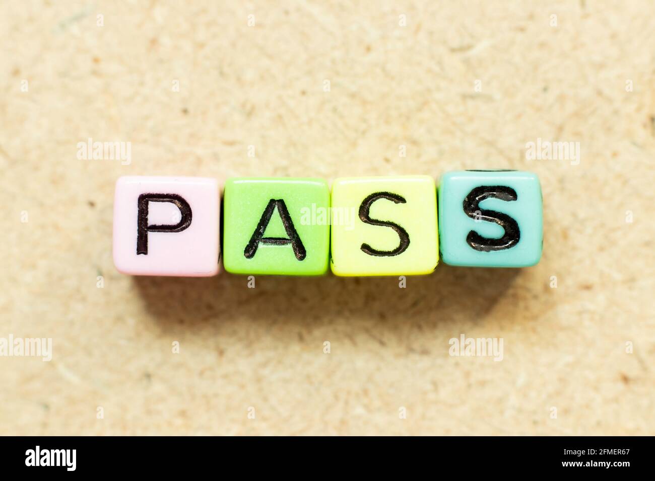 Color alphabet letter block in word pass on wood background Stock Photo ...