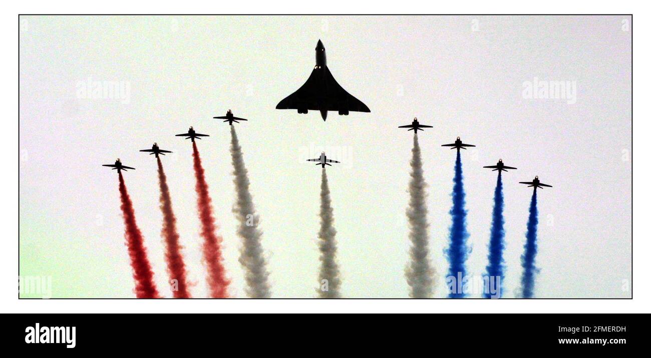 Golden Jubilee......Concorde and the Red Arrows fly past Buckingham ...