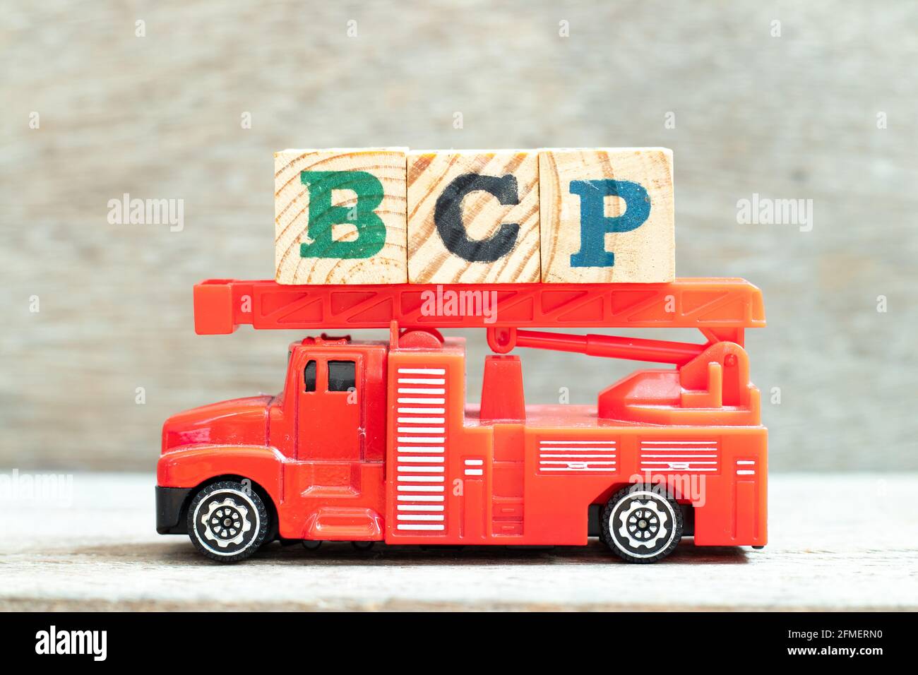 Fire ladder truck hold letter block in word BCP (abbreviation business ...