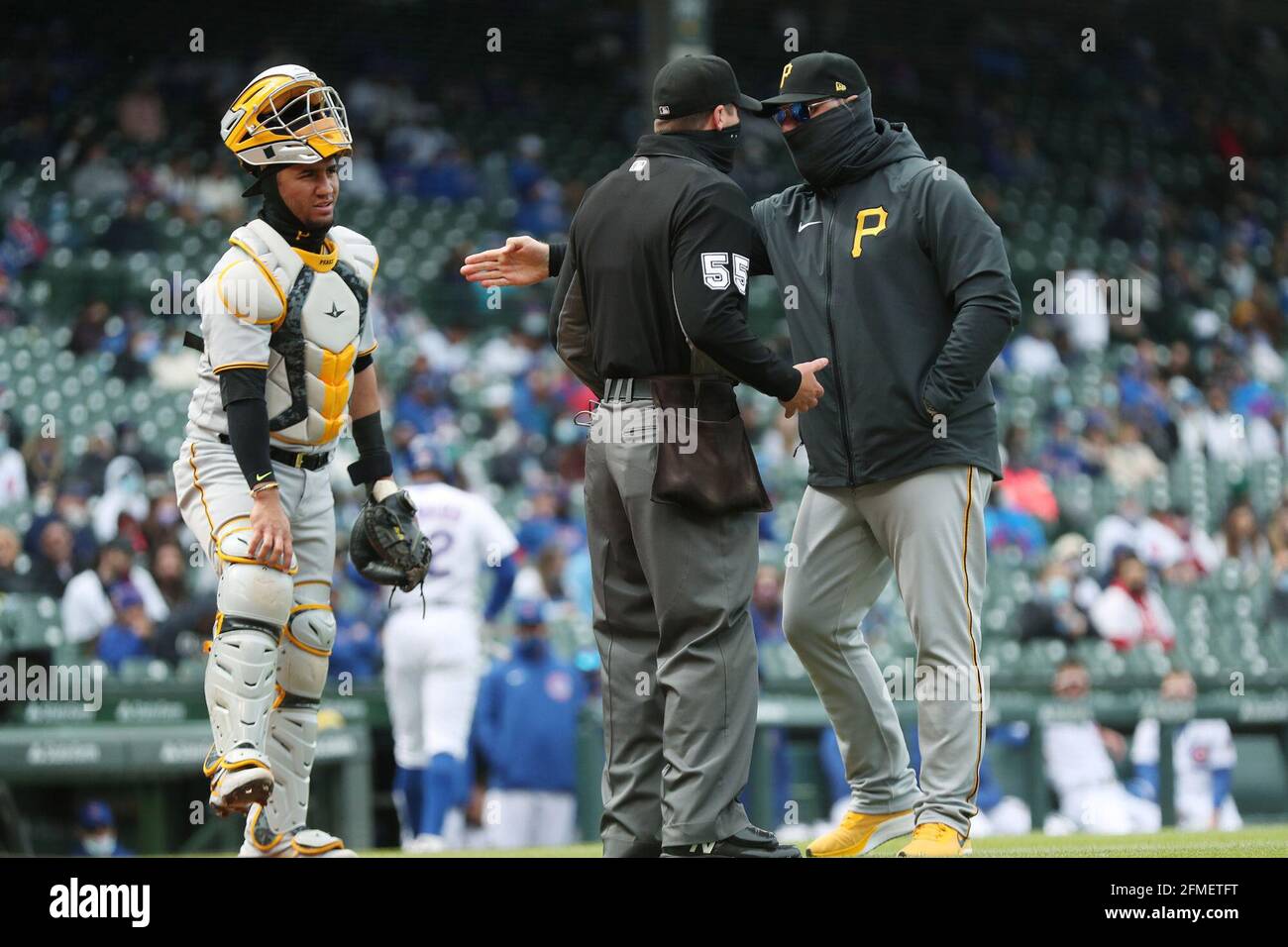 Pittsburgh Pirates manager Derek Shelton, right, argues a call with the ...