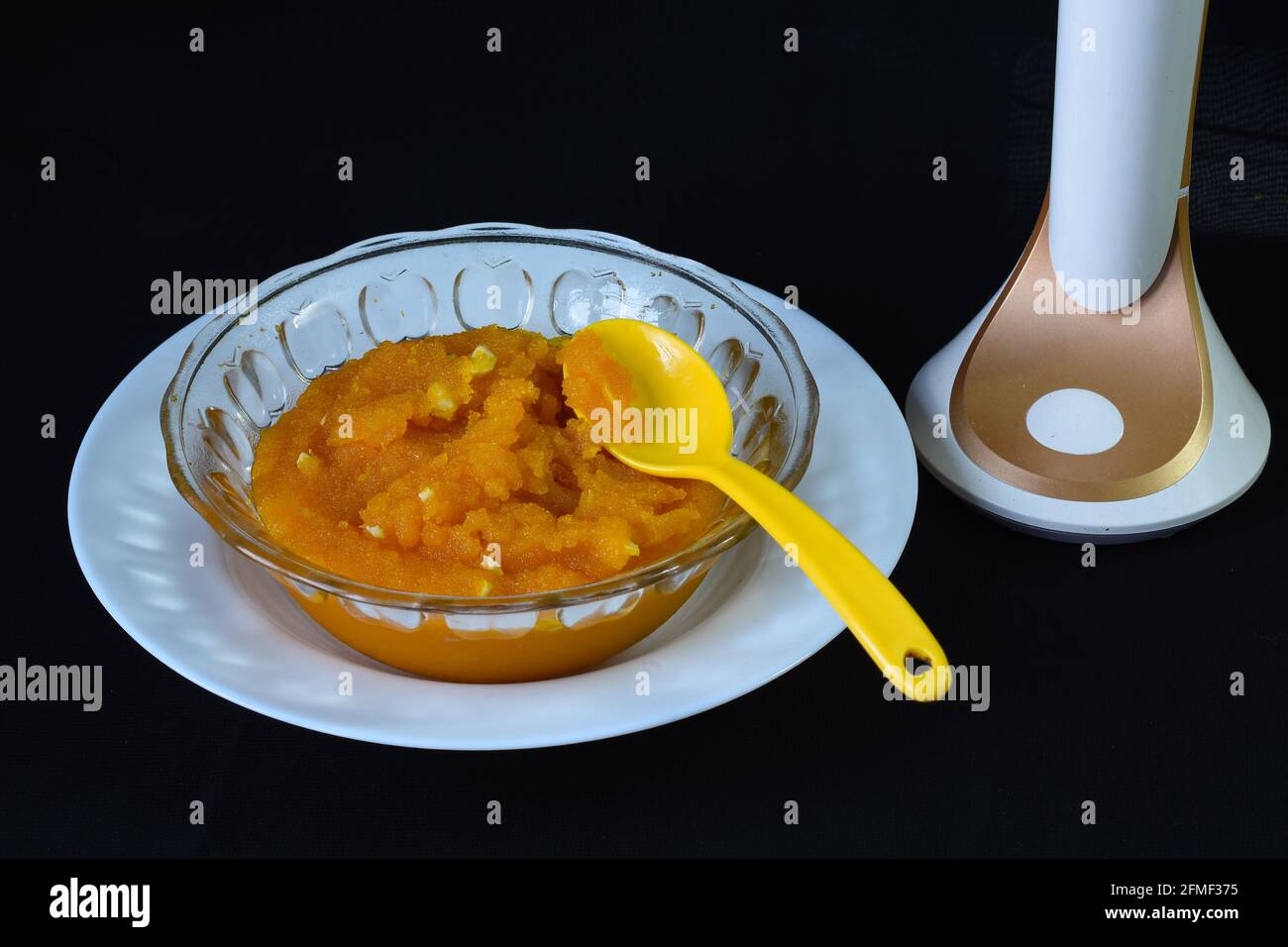 Orange semolina pudding with cashews ,commonly known as Suji halwa ...