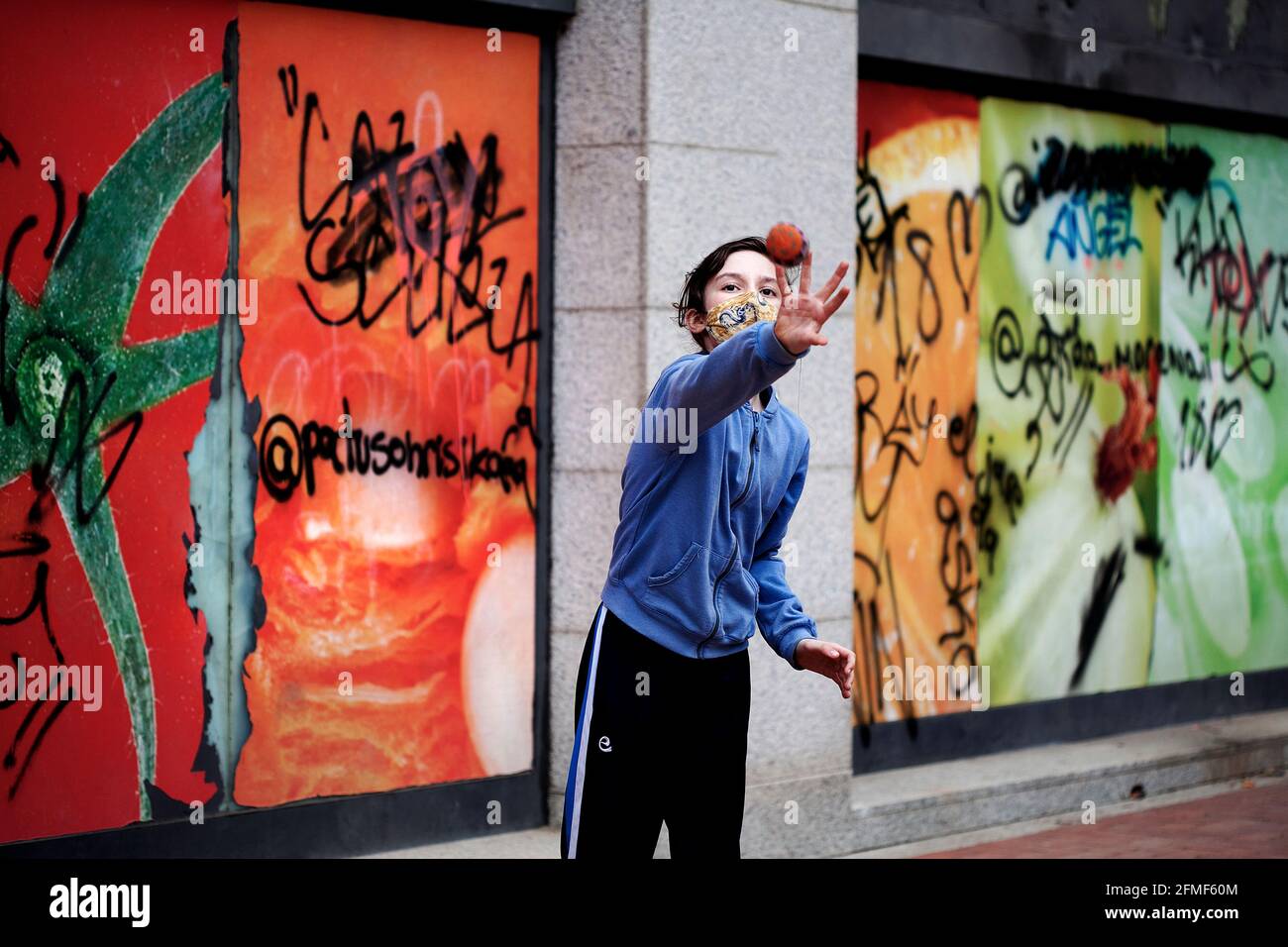 12 year-old boy catching a ball Stock Photo - Alamy