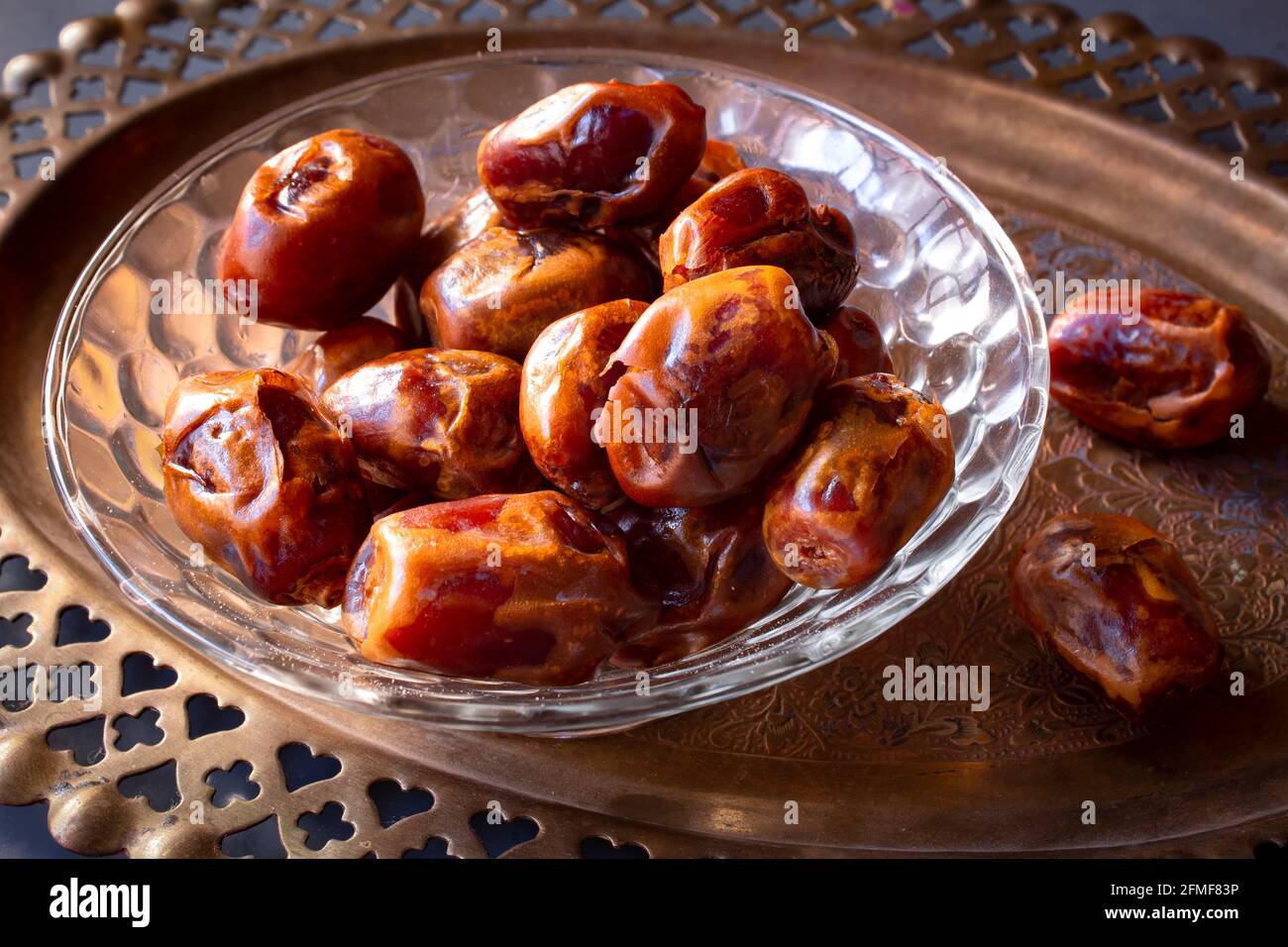 View of the sweet dates in a bowl which provides essential nutrients ...