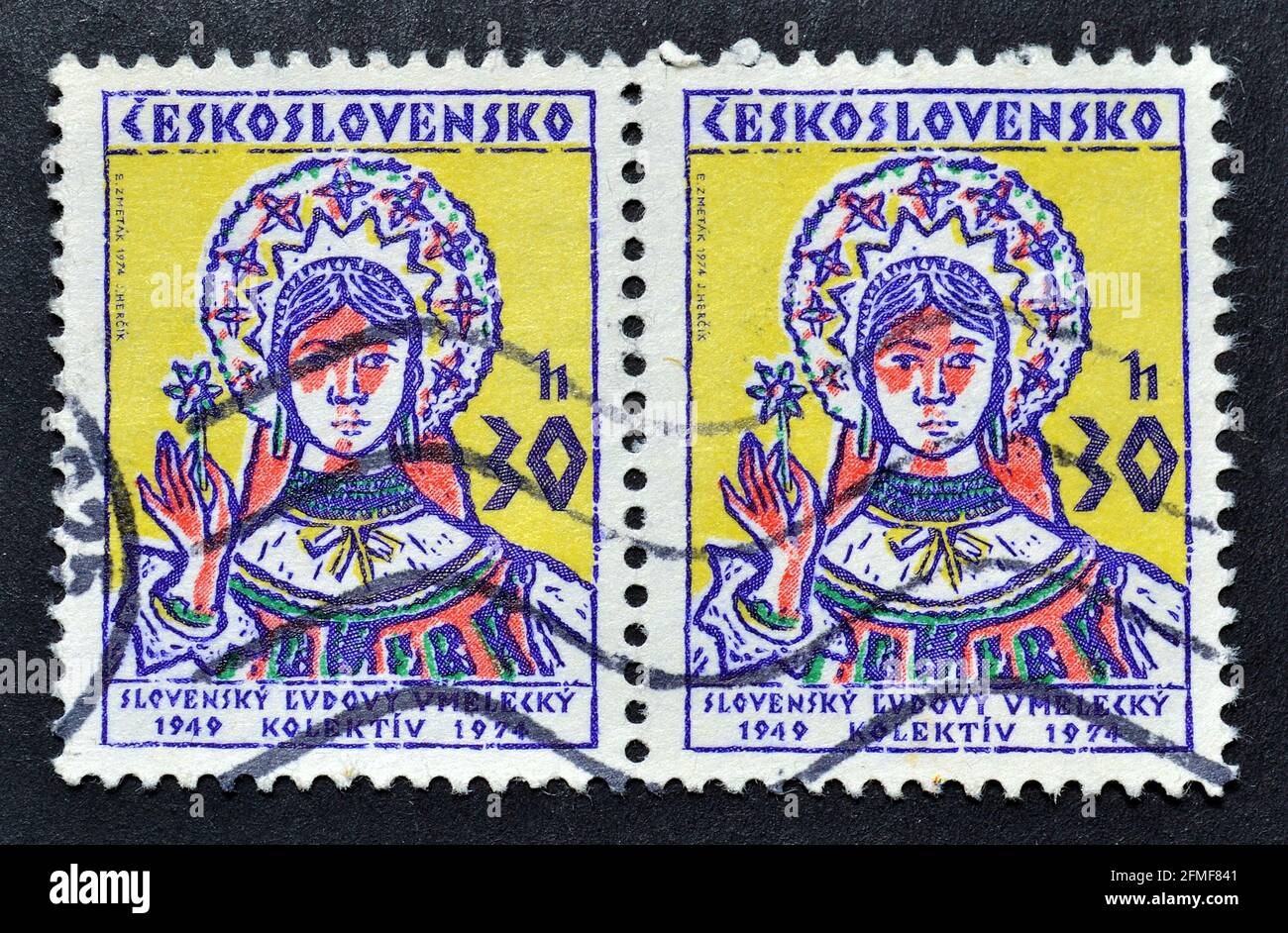 Cancelled postage stamp printed by Czechoslovakia, that shows Woman in ...