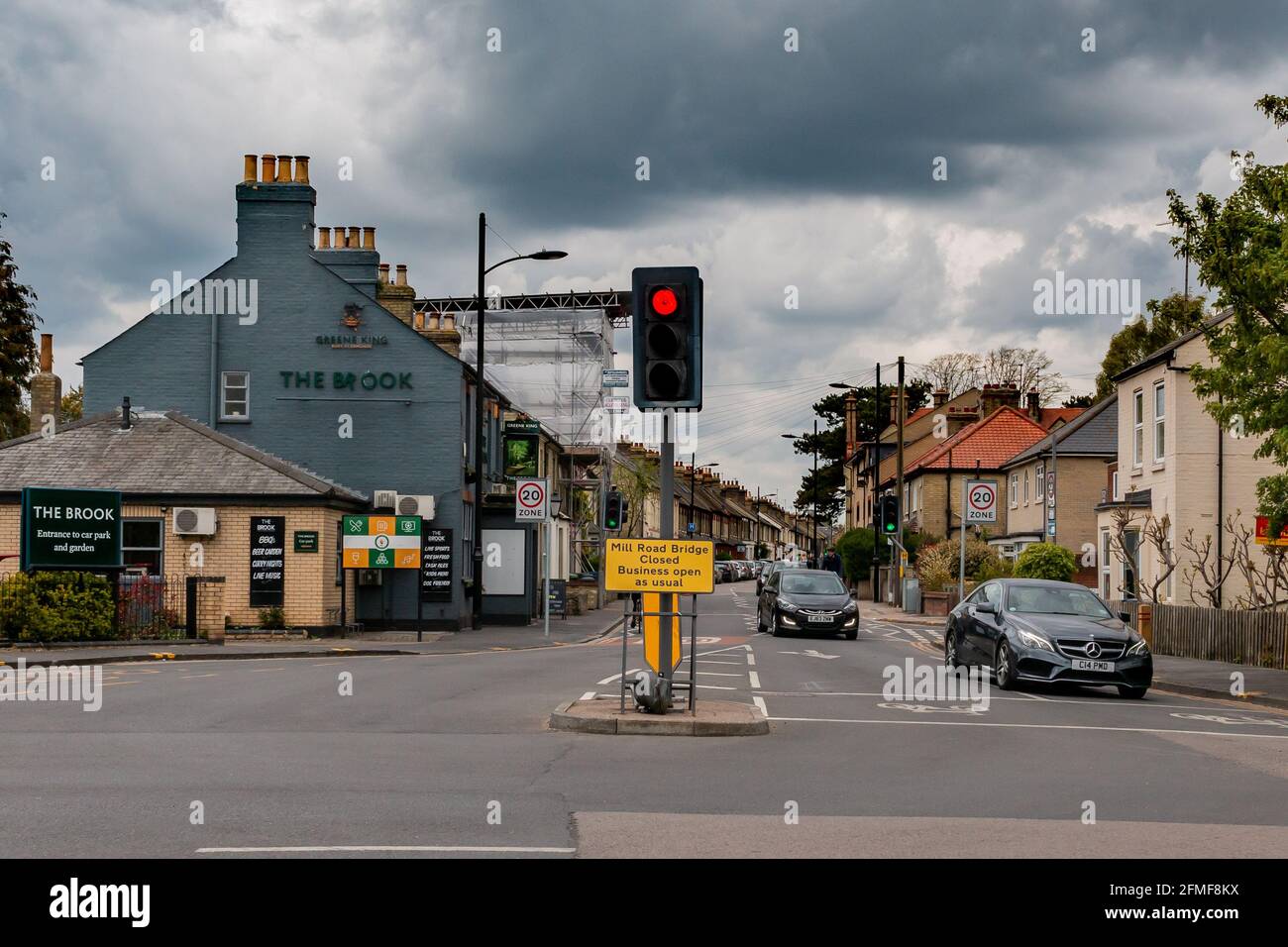 A yellow road sign saying - Mill Road Bridge Closed - Business open as ...
