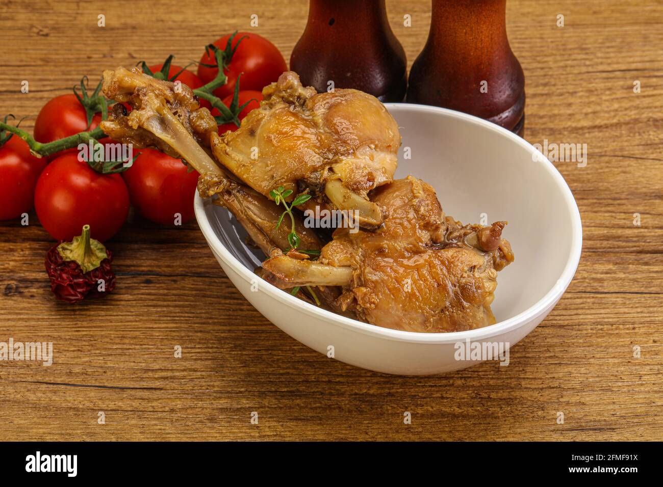 Rabbit stew in sweet and spicy sauce Stock Photo - Alamy