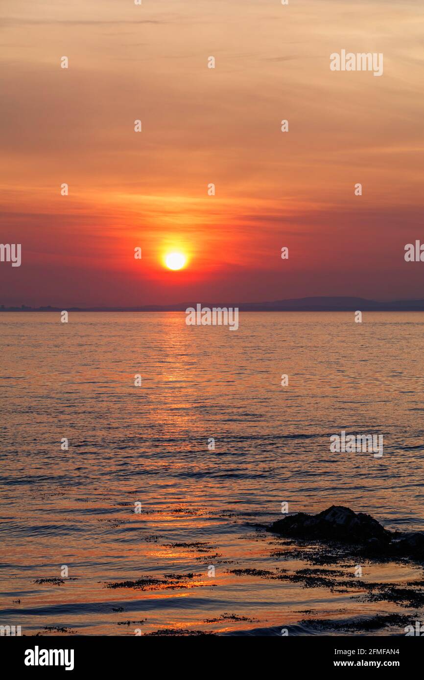 Sunset over the Bristol channel Stock Photo - Alamy