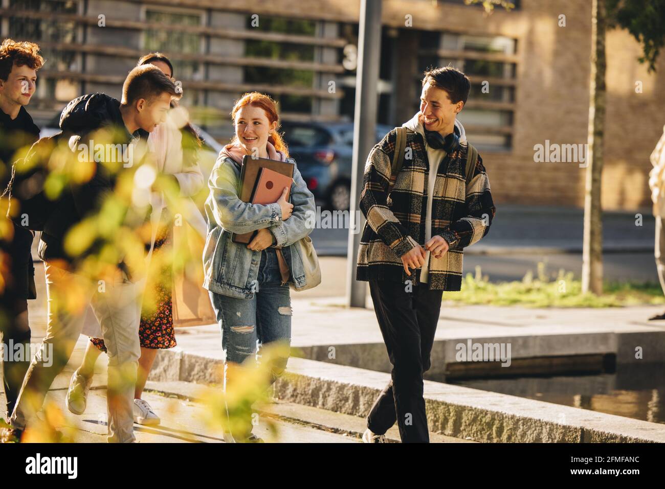 Friends Walking Together At School