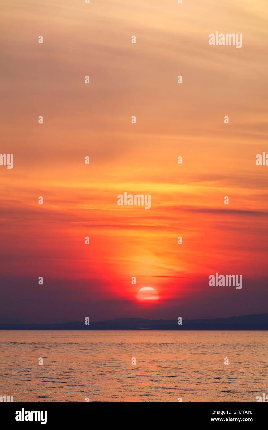 Sunset over the Bristol channel Stock Photo - Alamy