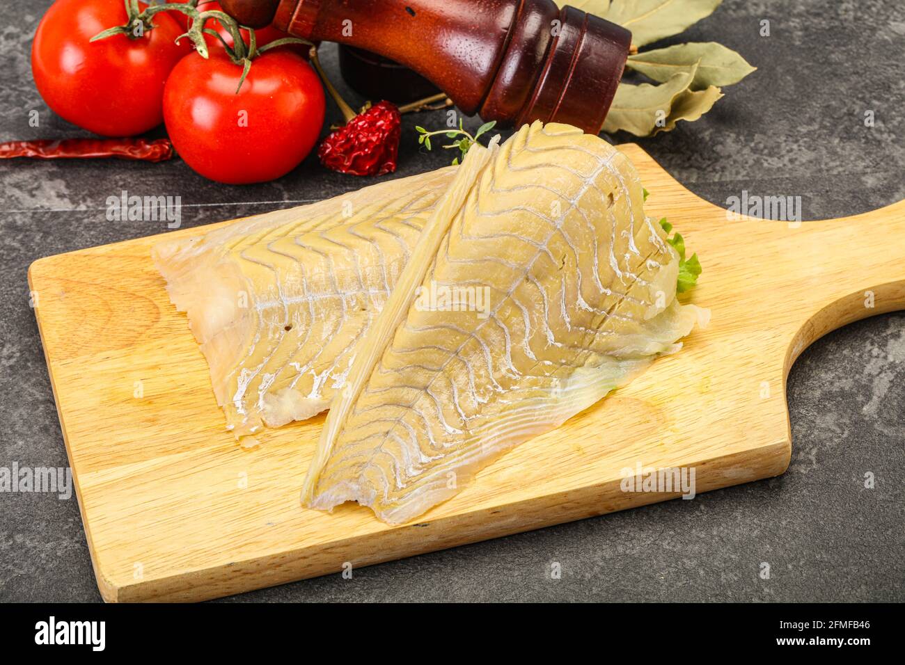 Raw cod fish fillet for cooking Stock Photo - Alamy