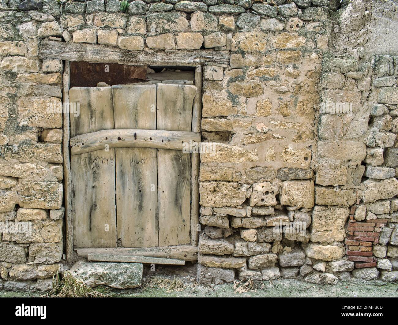 An old wooden gate of an abandoned building Stock Photo - Alamy