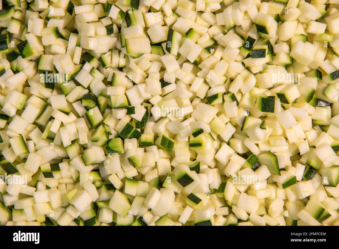 Chopped raw zucchini, close-up, diced zucchini macedonia Stock Photo ...